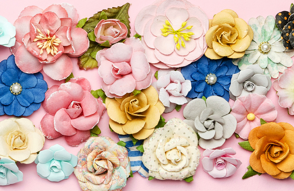 Lots Of Colorful Homemade Paper Flowers On Pink Background In The 