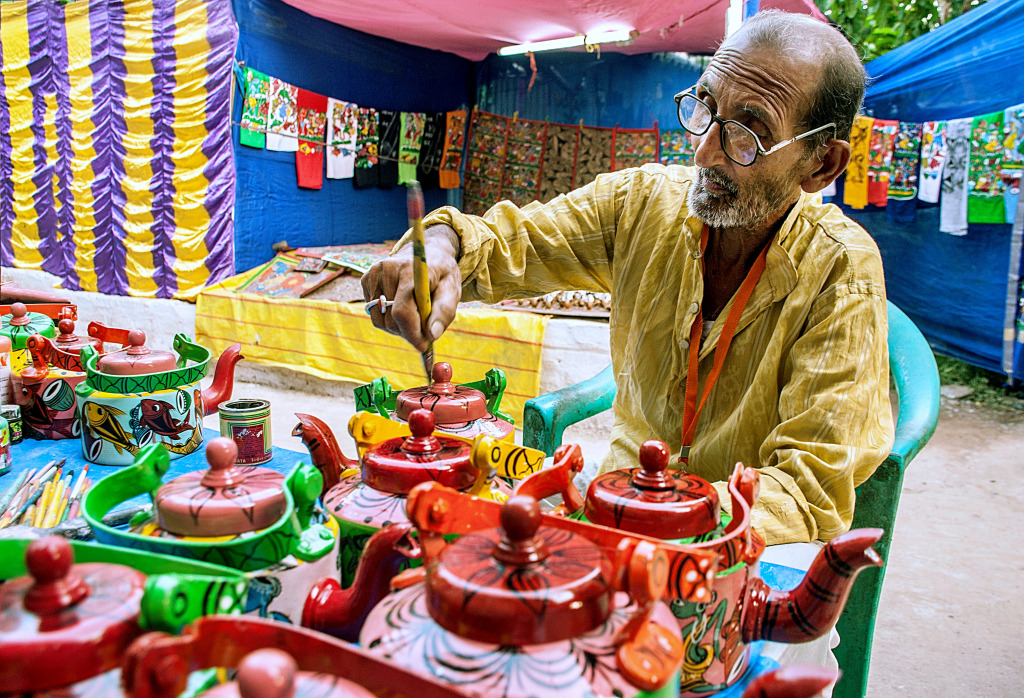 West Midnapur, West Bengal, India 11.16.2018. A Senior Artisan Coloring ...